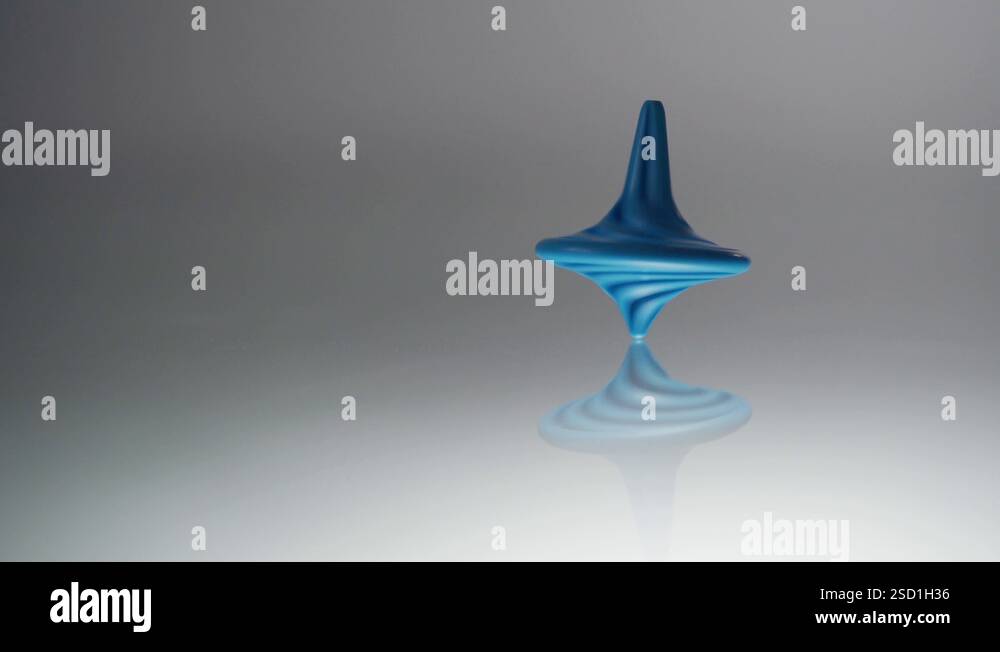 Blue spinning top spinning, wobbling and stopping. Whirligig in action ...