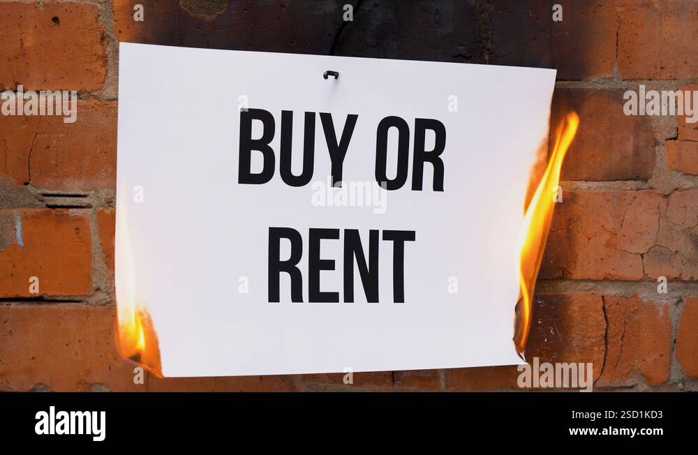 The inscription word Buy or Rent burns, smoke and turns into ashes ...