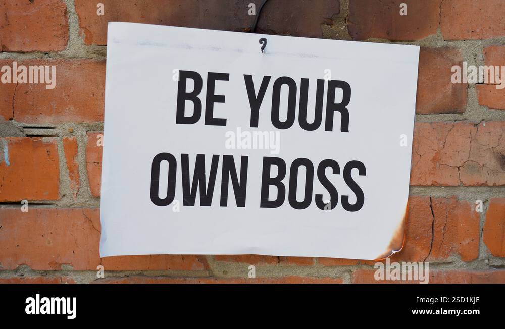 The inscription word Be Your Own Boss burns, smoke and turns into ashes ...