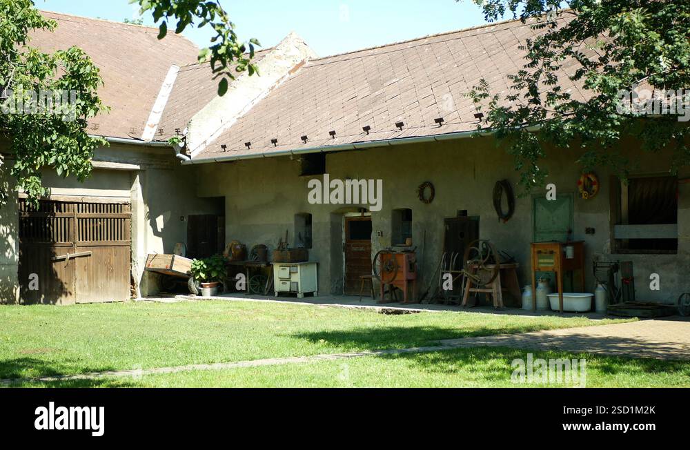 Traditional Moravia cottage old folk Hana grunt with with barn, machine ...