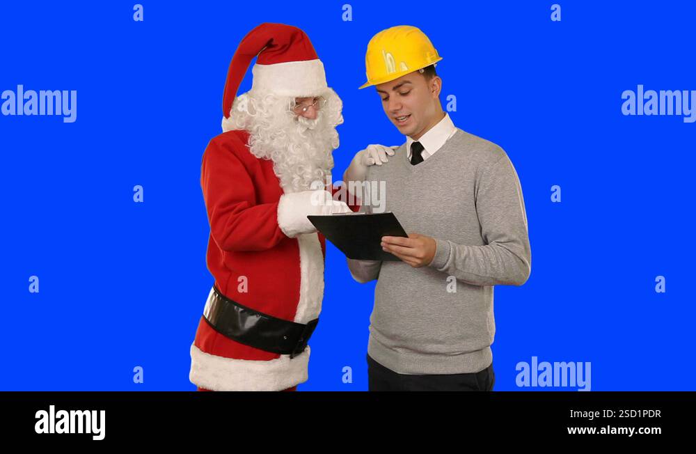 Santa Claus and Young Architect Blue Screen Chromakey Stock Video ...