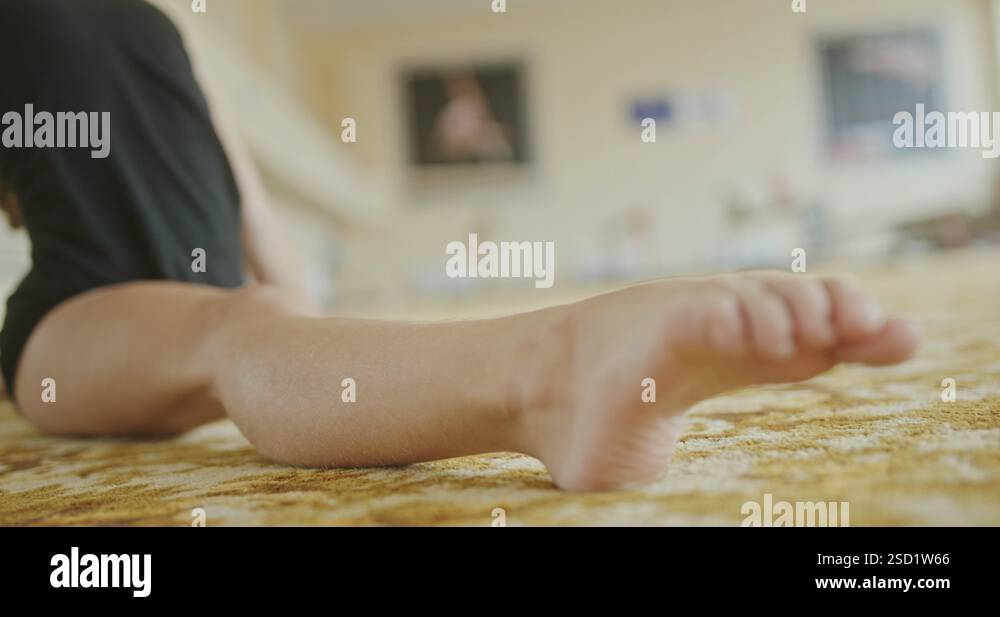 Little girl stretching in front splits Stock Video Footage - Alamy