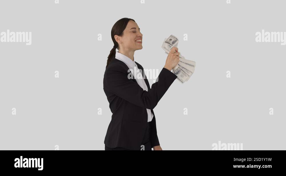 Businesswoman waving dollar notes over white background Stock Video ...