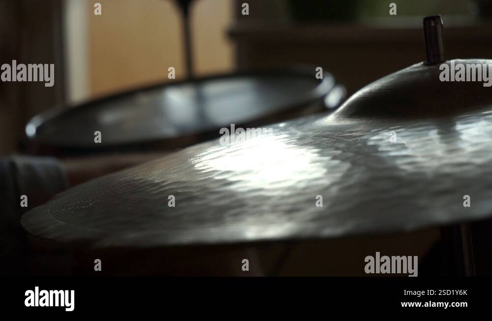 Drummer's hands quickly hit the snare drum and at the end strongly on ...