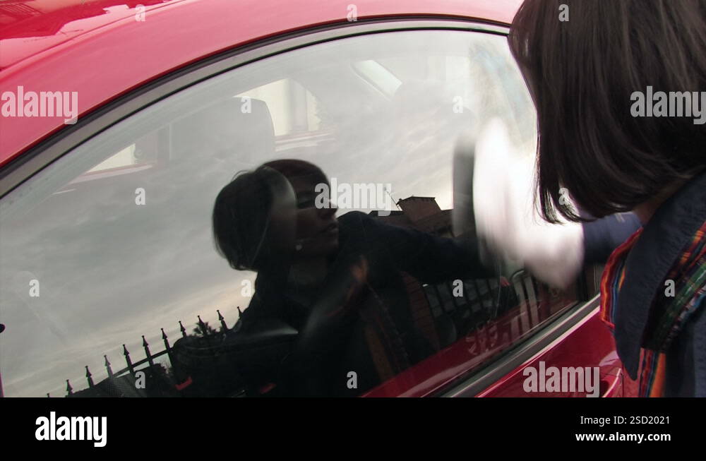 polishing car window Stock Video Footage - Alamy