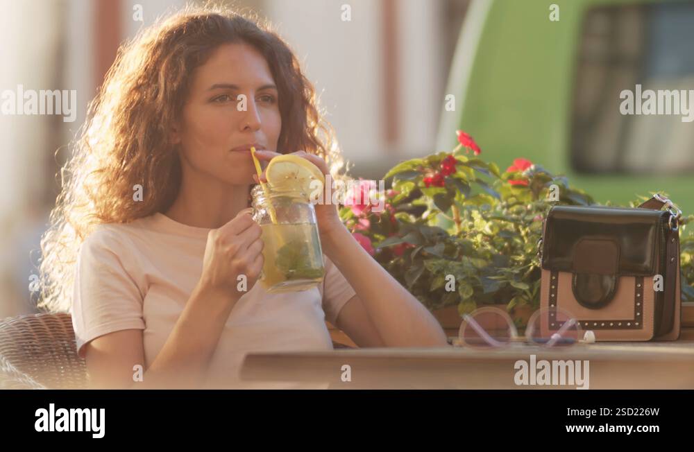 Portrait of Beautiful Woman Drinking Cocktail Outdoors Stock Video ...