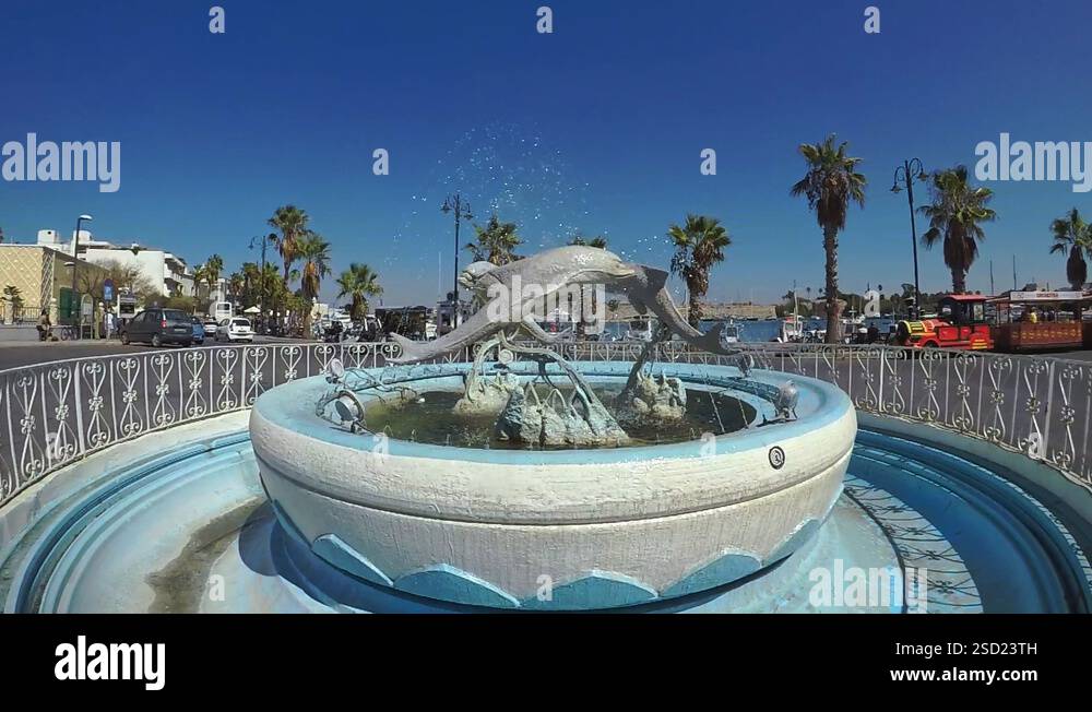The dolphin fountain on the Greek island of Kos Stock Video Footage - Alamy