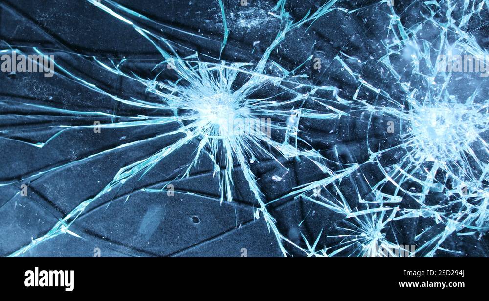 Shattering glass screen with a hammer. Breaking and cracking screen on ...