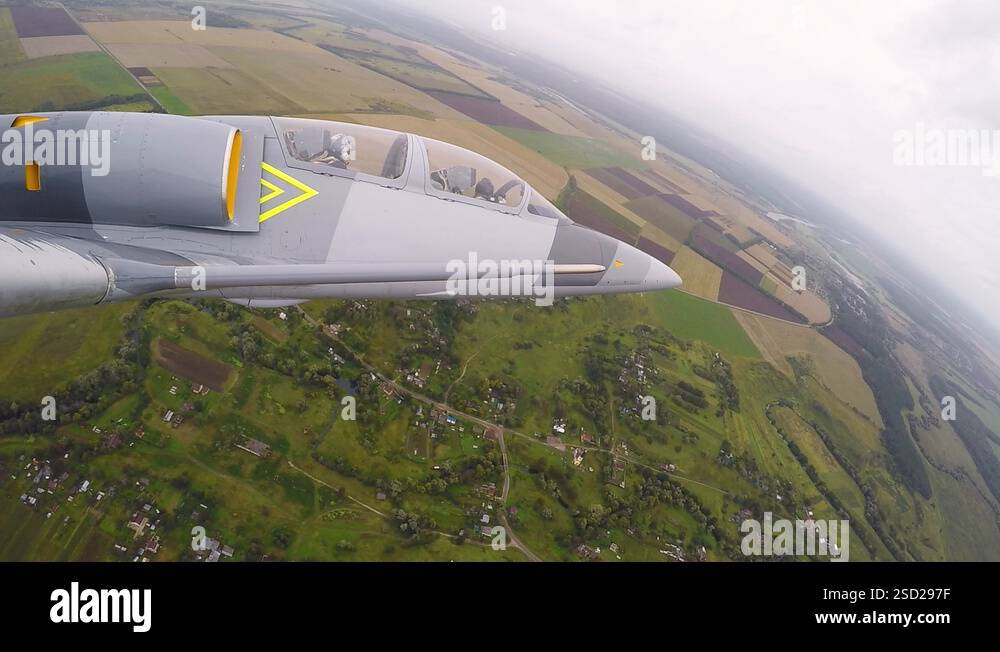 Jet aircraft tilted to the left and fly high. View from the right wing ...