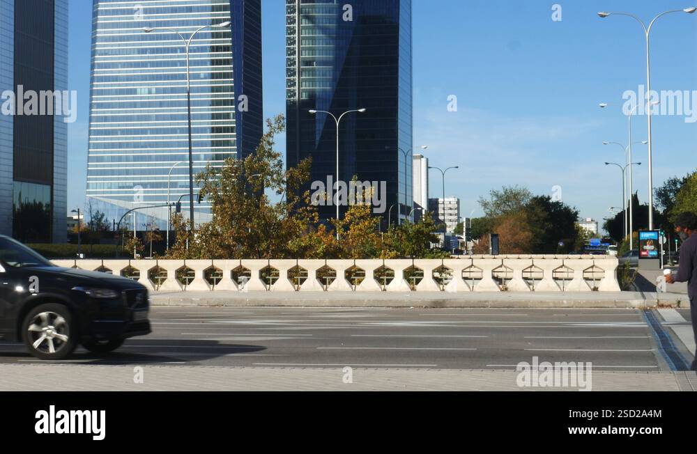 Homeless older man begging cars on a traffic stop in the Plaza de ...