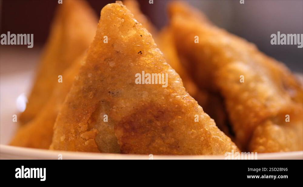 Deep fried samosa Stock Videos & Footage - HD and 4K Video Clips - Alamy