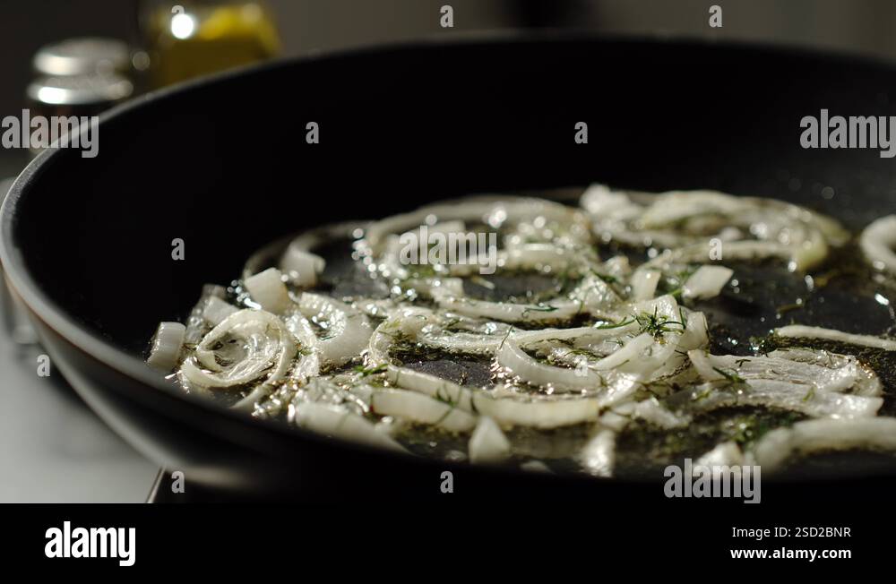 Frying Chopped Onion Rings In Boiling Cooking Oil On Fry Pan Stock ...
