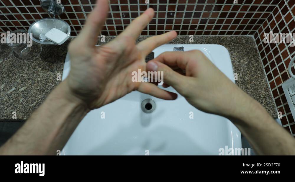 Man removing wedding ring Stock Video Footage - Alamy