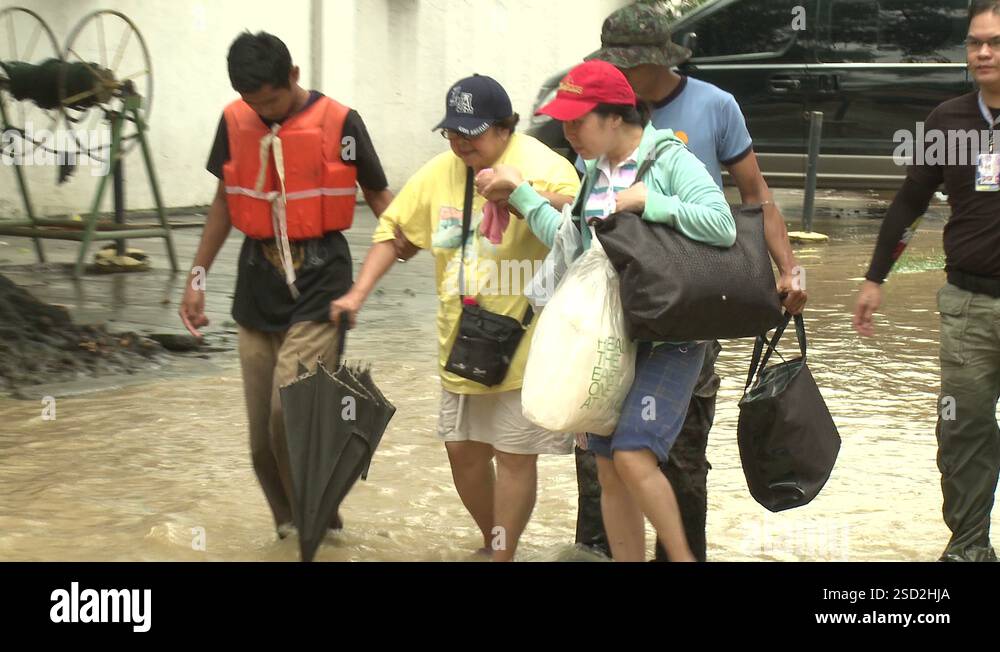 Elderly Couple Rescued From Flooding In Manila Philippines Stock Video ...