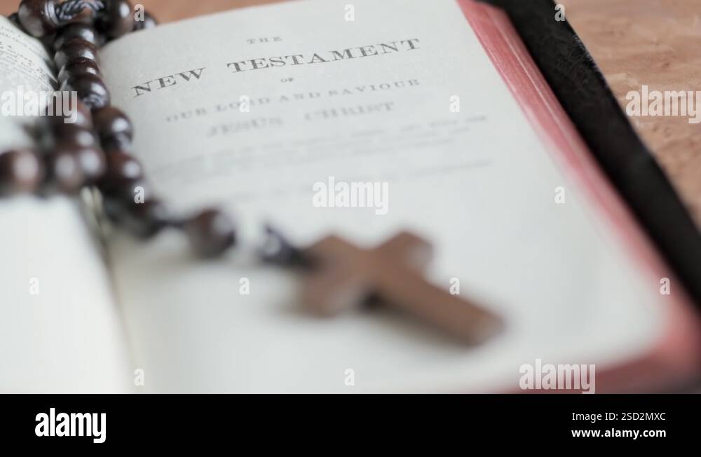 Bible and Rosary Rack Focus Stock Video Footage - Alamy