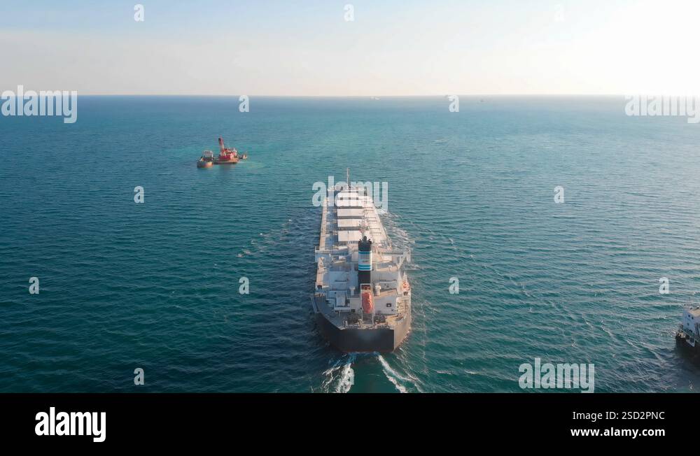 The bulk carrier left the port and moves in the right direction at high ...