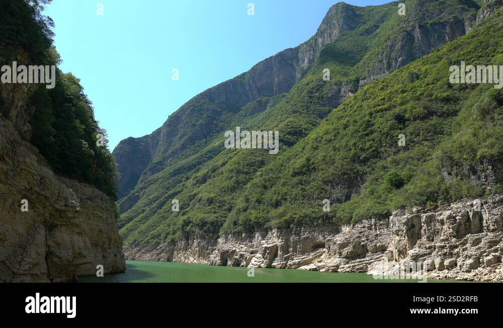 Lesser Three gorge scenic view from a moving boat cruise on river in ...