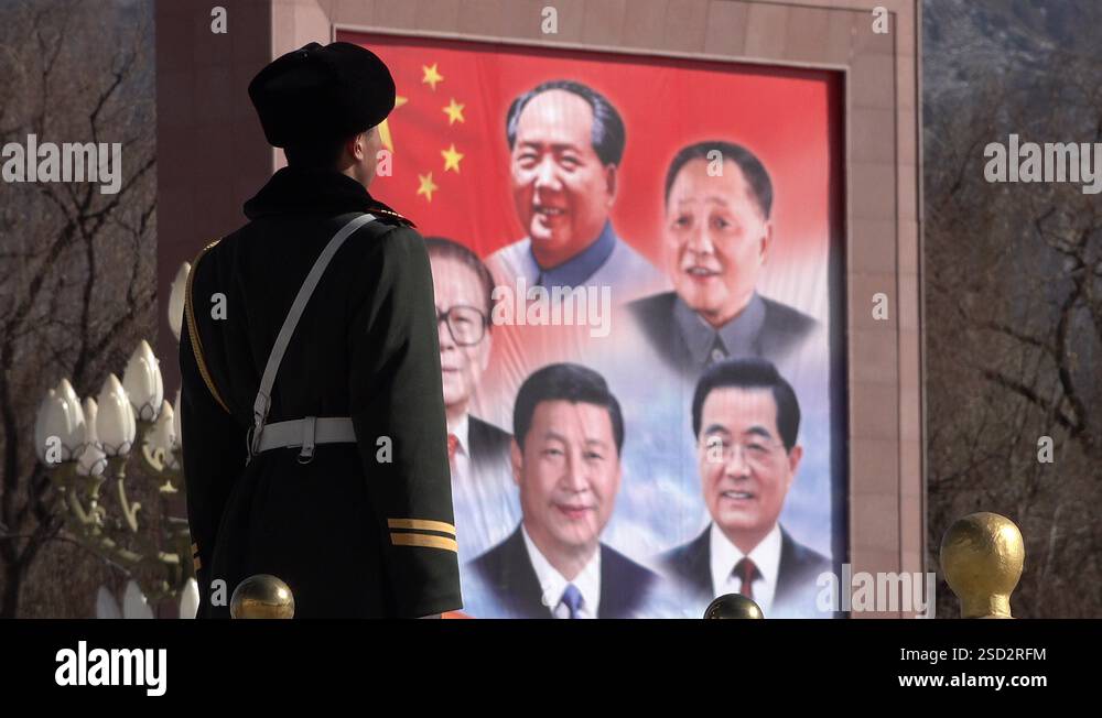 China propaganda security - army guard and political billboard Lhasa ...
