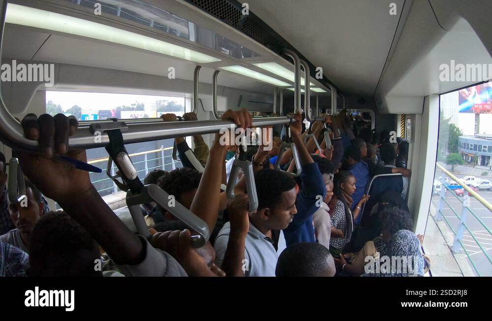 China in Africa - train passengers on Chinese light rail system Addis ...