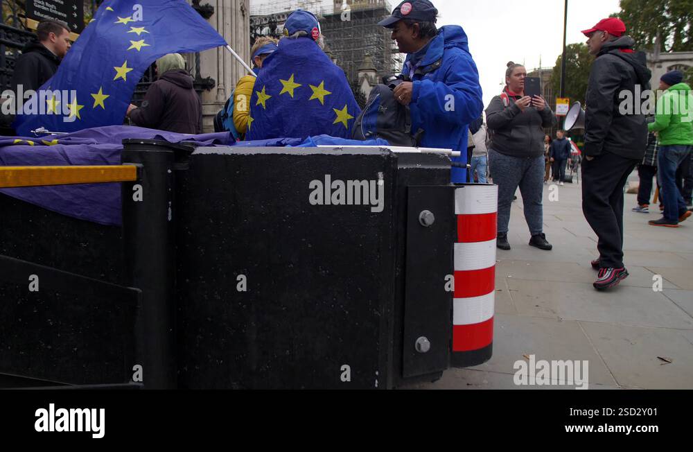 Rising Protestors holding EU flag no deal Brexit slow motion 4K Stock ...