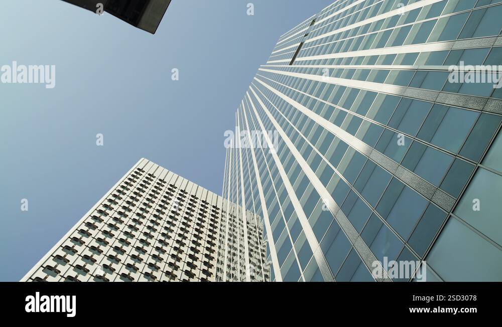 Two Skyscrapers with green glass windows at business district in Paris ...