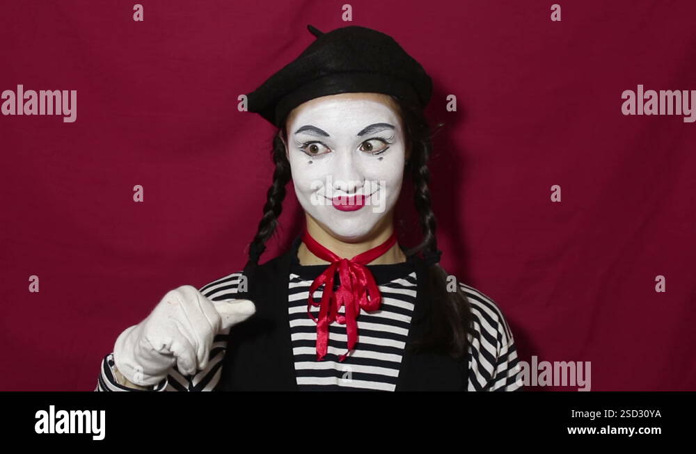 Beautiful mime girl waves her hand, saying goodbye Stock Video Footage ...