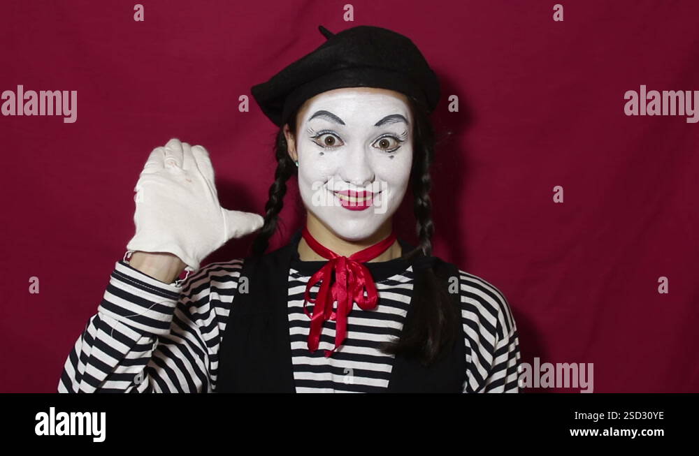 Beautiful mime girl waves her hand, saying goodbye Stock Video Footage ...