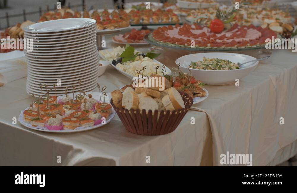 Party catering banquet table Various snacks in plate, snacks Stock ...