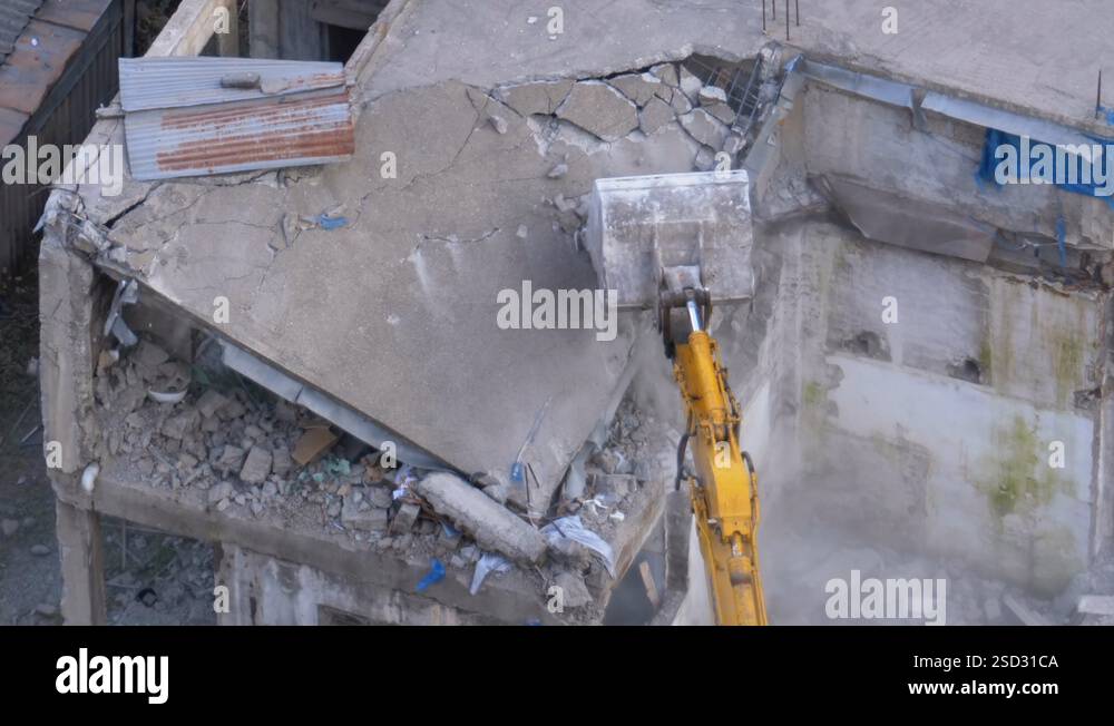 Destroying Old Concrete House Using Mechanical Arm of Bulldozer on ...