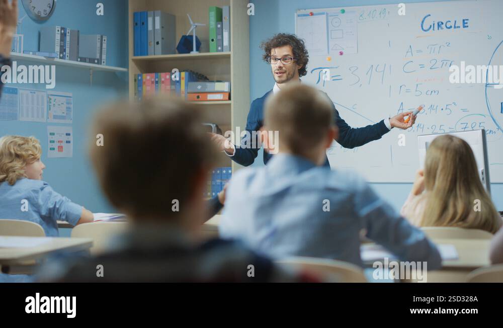 Teacher Explains Lesson to a Diverse Classroom of Bright Children, Ask ...