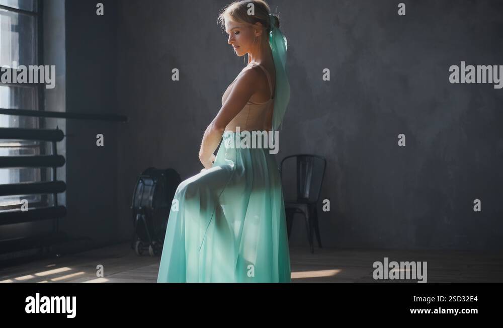graceful woman dancing ballet in the light from the window Stock Video ...