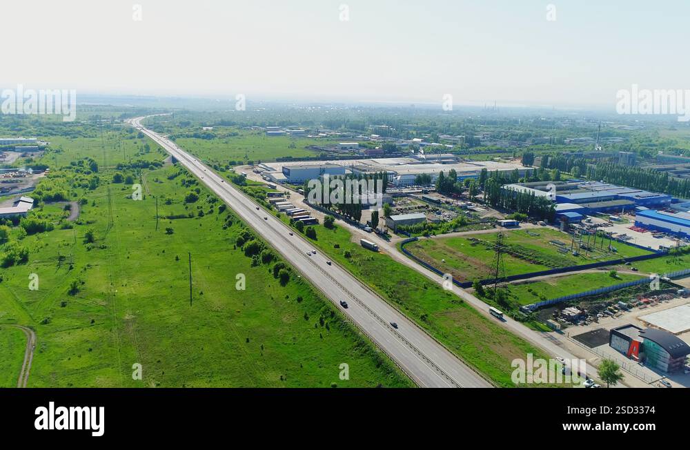 highway between production factory and lush field upper view Stock ...