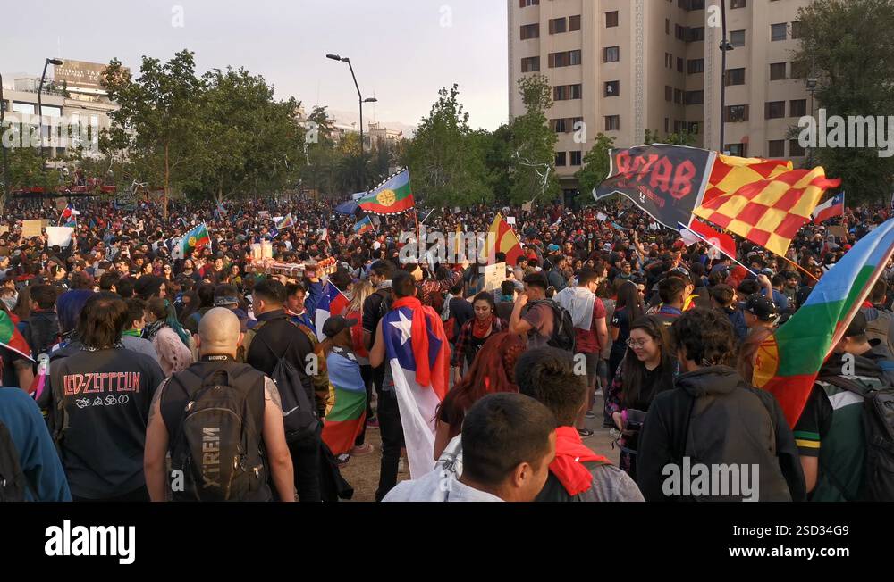 Protesters crowd claiming and singing during latest riots at Santiago ...