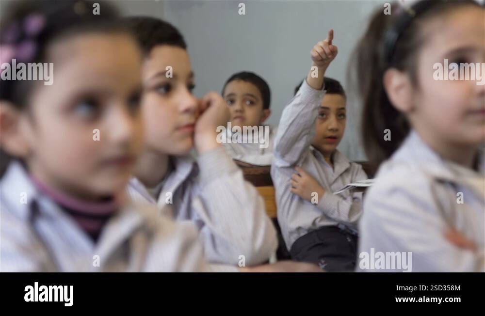 Students in elementary school interact with teacher, Beirut, Lebanon ...