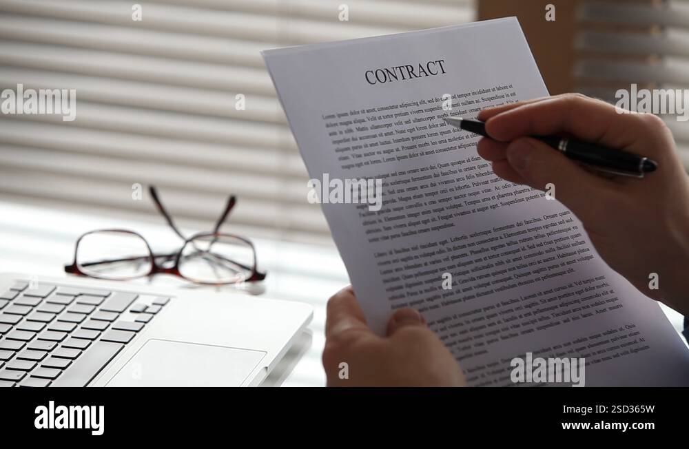 contract reading, legal advice, business agreement printed document ...
