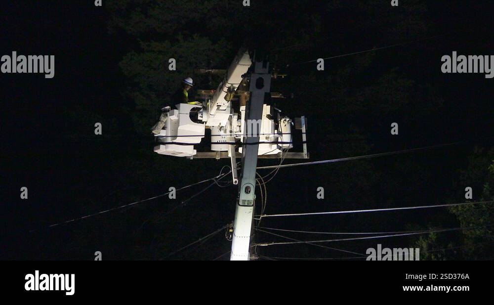 Worker Fixing a Transformer Stock Video Footage - Alamy