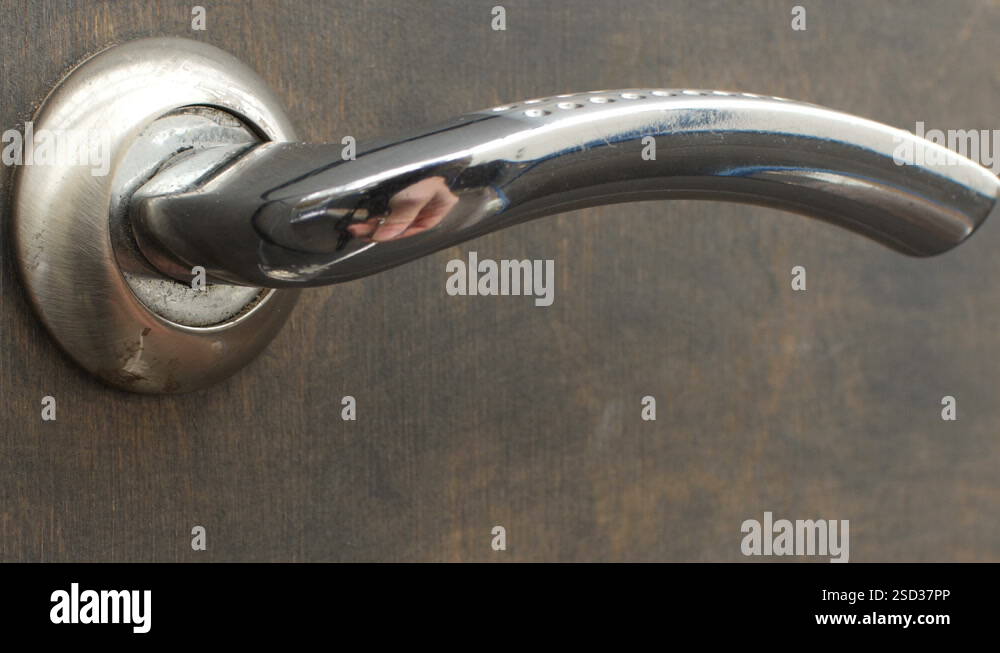 man unlocks the door lock Stock Video Footage - Alamy
