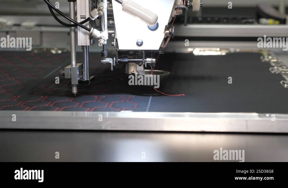 Automated machine embroidery. Robotics with cnc works in the sewing ...