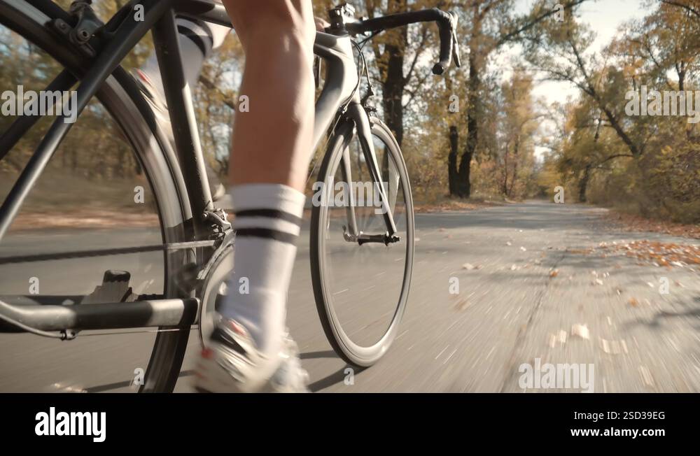 Cyclist Twists Pedals.Cycling Athlete Road Bicycle And Bike Wheel ...