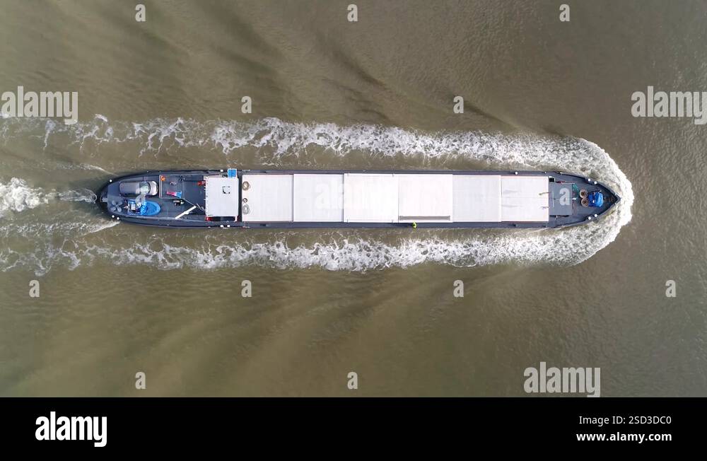 Aerial top down view of barge moving over water 4k Stock Video Footage ...