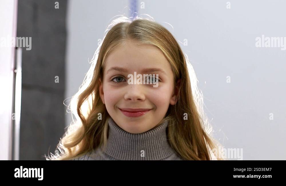 little girl talking on camera close-up, the child talks about himself ...