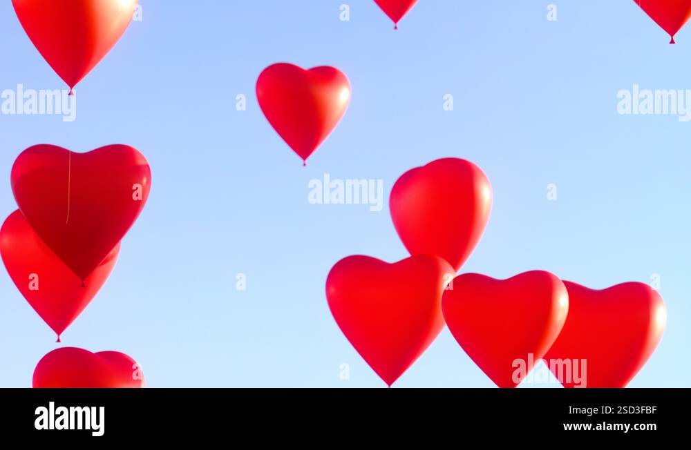 Seamless looping animation with many heart-shaped red balloons. Love ...