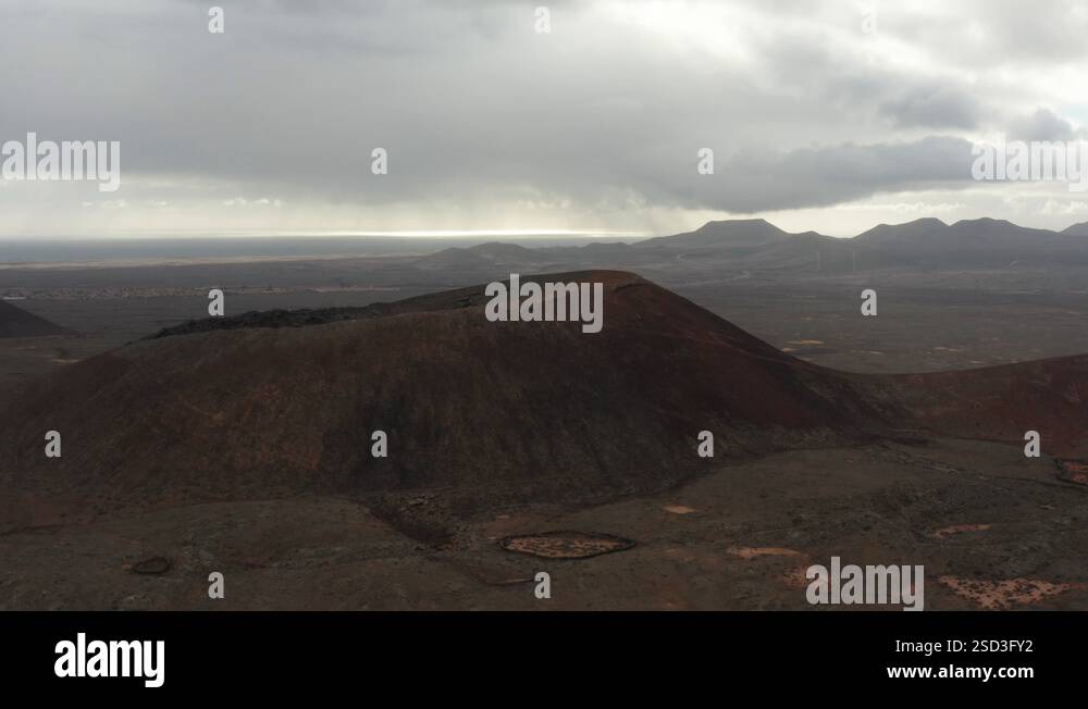 Overcast cloudy and dull volcano aerial view Stock Video Footage - Alamy