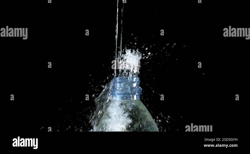 Water Exploding and Splashing on Bottle against Black Background, Slow ...