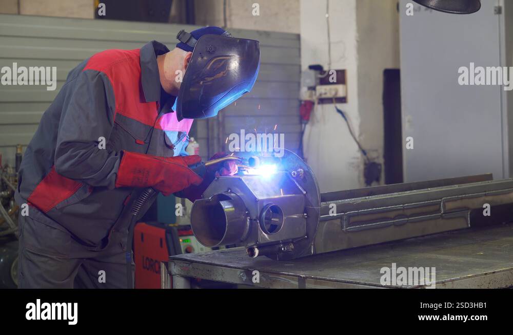 Laser high-temperature welding, sparks, workers duties, glasses for ...