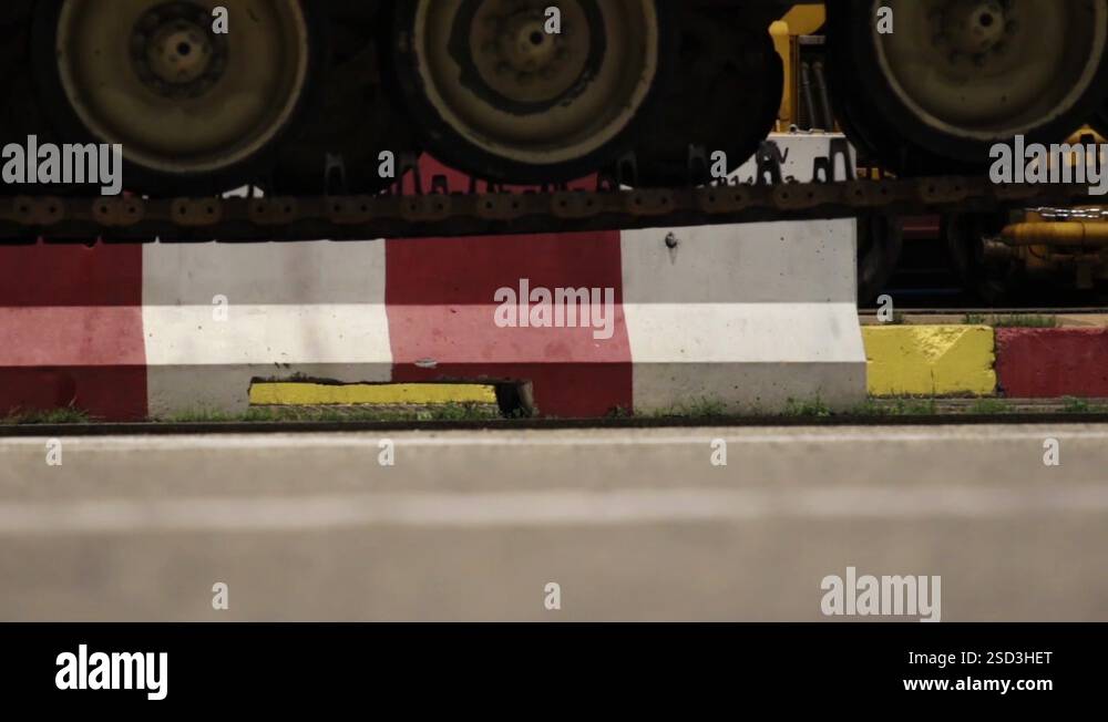 M2A3 Bradley Fighting Vehicle being lowered to ground by crane during ...