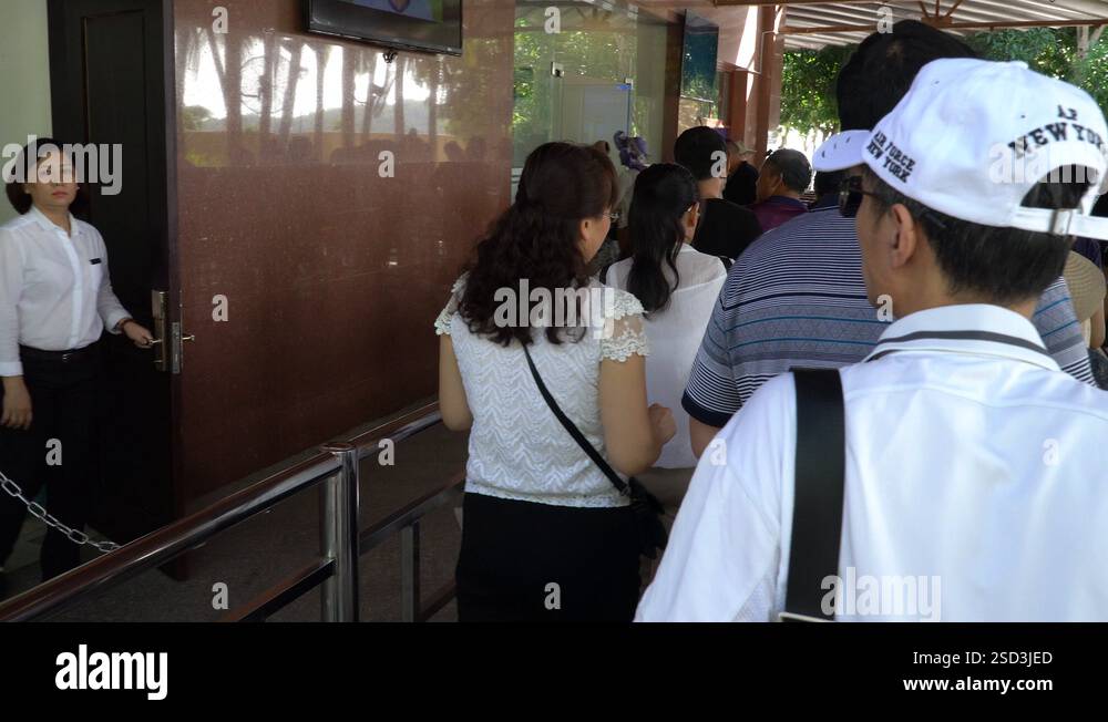 The queue of people. A crowd of people moving to the turnstile ...