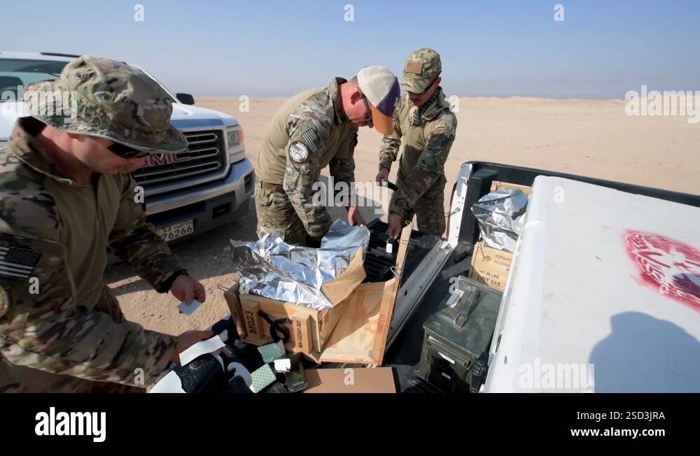 U.S. Airmen unpacking and cutting explosives for EOD's in Kuwait Stock ...