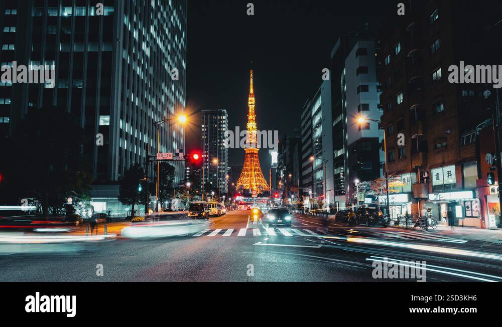 8K UHD time-lapse of illuminated Tokyo tower, car traffic transport at ...