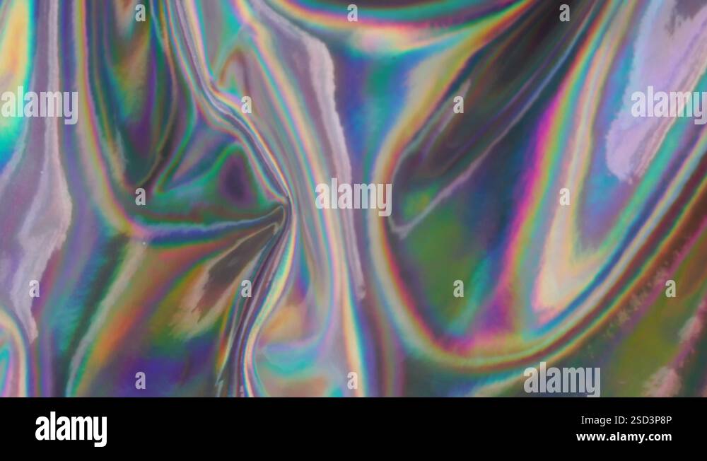 Iridescent rainbow colored holographic foil. Real texture rotating ...